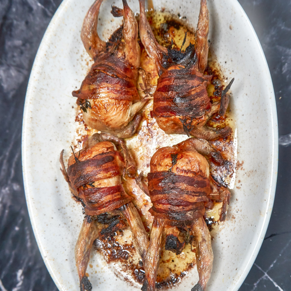 Roasted Stuffed Quail Wrapped in Bacon - Cuisine Reinvented